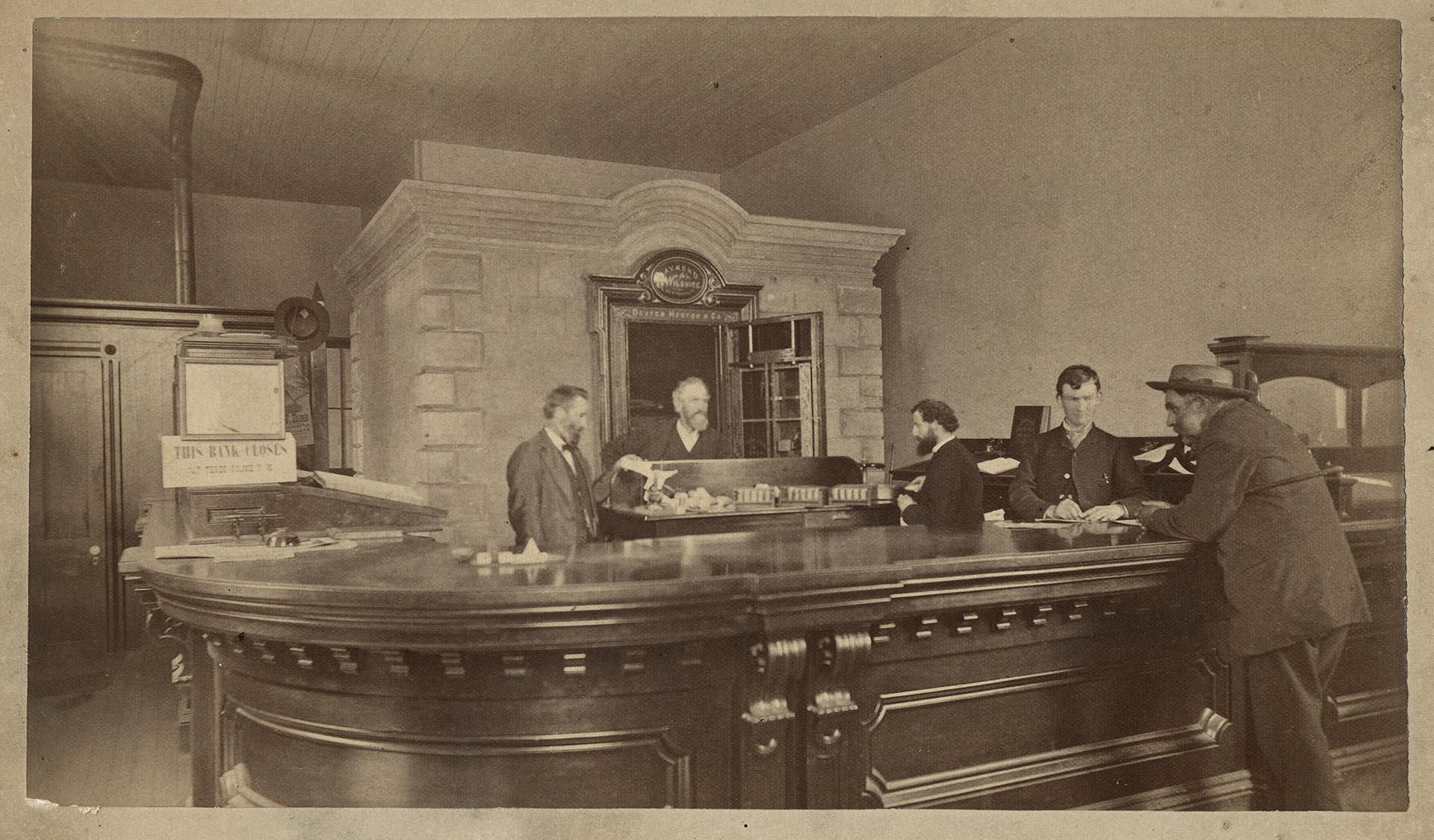 Men inside Dexter Horton Bank, Seattle, 1882 – Museum of History & Industry