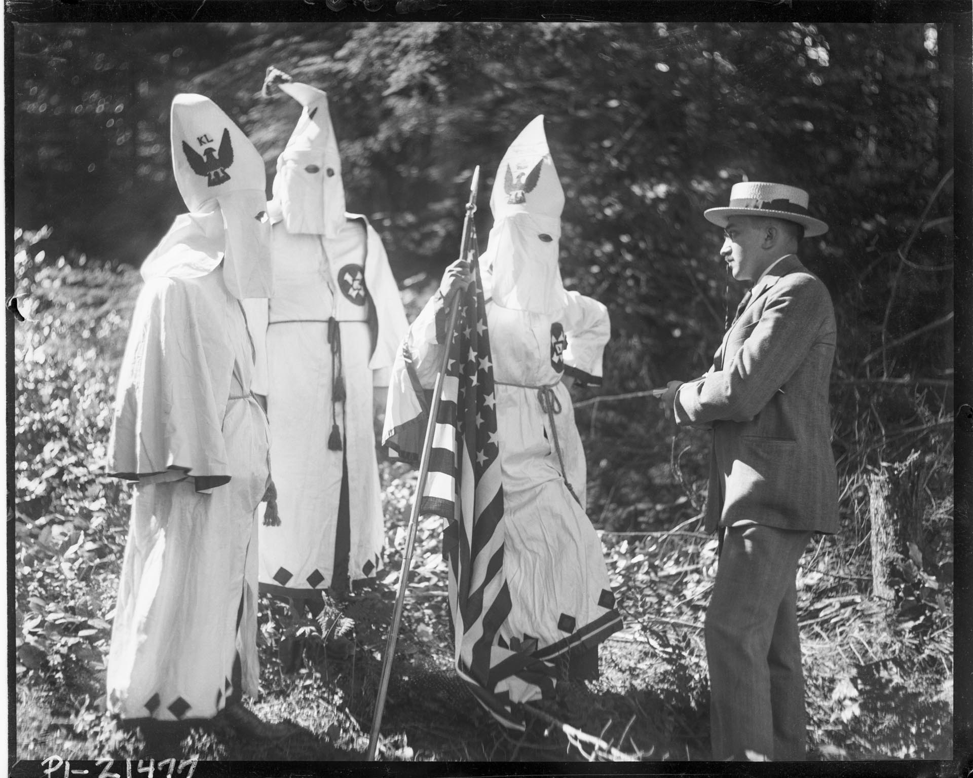 Three Klansmen talking to PI reporter Robert Berman, circa 1923 ...